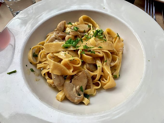 Fettuccine that whispers sweet nothings to mushrooms. The marriage of pasta, fungi, and herbs creates a dish worth crossing boroughs for.