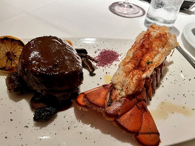 The ultimate power couple: a perfectly seared filet and a lobster tail that practically begs you to dip it in that melted butter.