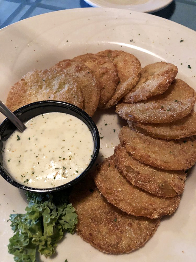 These golden-fried delights aren't just appetizers – they're the opening act that threatens to upstage the headliner. Crispy, creamy, and utterly irresistible.