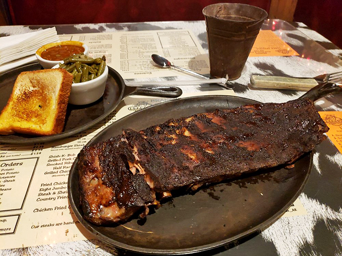 These ribs aren't just falling off the bone—they're practically jumping into your mouth with a smoky enthusiasm that's downright infectious.