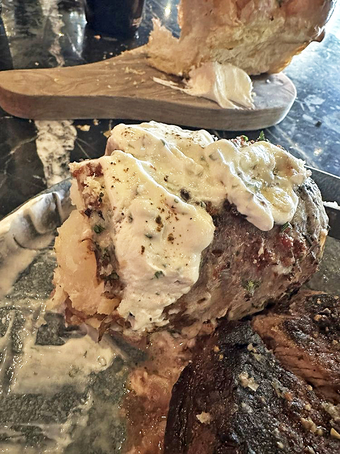 This Hasselback potato wears its herb-infused butter like a couture dress, proving that even spuds can be glamorous in the right hands.