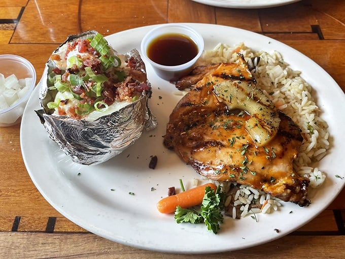 Hawaiian chicken brings the island vibes inland, nestled beside a rice pilaf that's playing a delicious supporting role.