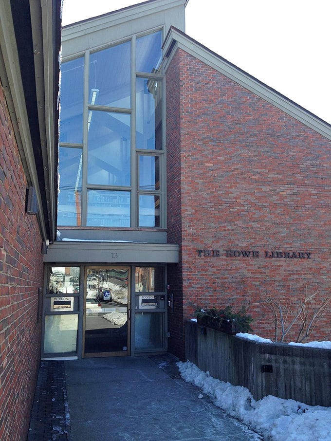 The Howe Library's angular entrance offers a portal to literary adventures. Even in winter, this brick sanctuary beckons bookworms with the promise of warmth and wisdom.