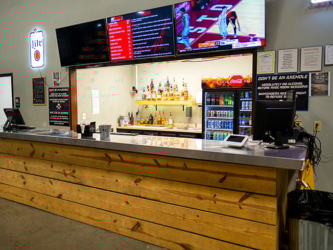 The bar area offers liquid courage before racing or liquid consolation after discovering you're not the next Mario Andretti.