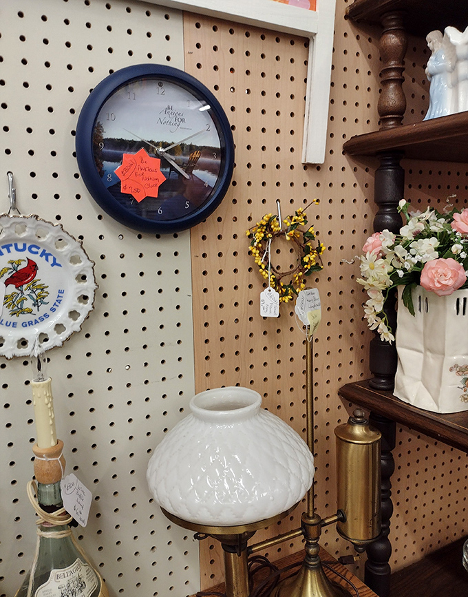 A wall clock that's seen more time than we have, surrounded by decor that's ready for its second chance at making a home beautiful.