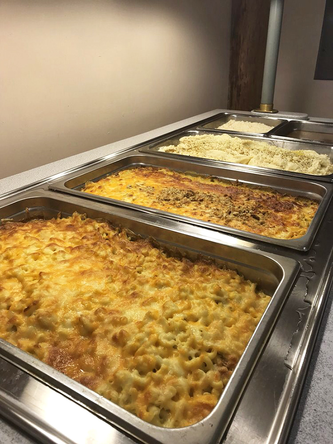 The mac and cheese has achieved that perfect golden-brown crust—nature's way of telling you someone cared enough to wait those extra five minutes.