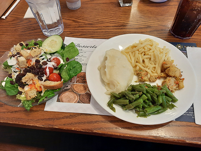 A plate that understands balance&mdash;crisp salad on one side, creamy mashed potatoes on the other, with noodles playing the delicious mediator.