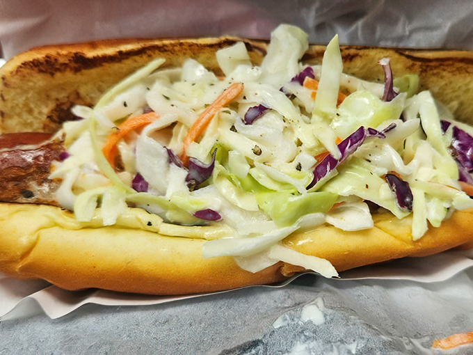 The Mata Hari seduces with its creamy coleslaw topping. It's a spy in the world of hot dogs &ndash; mysteriously delicious and impossible to forget.