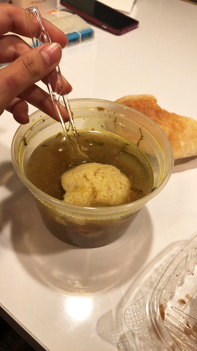 Even in takeout form, this matzo ball soup maintains its dignity. Some foods are so good they refuse to be diminished by plastic.
