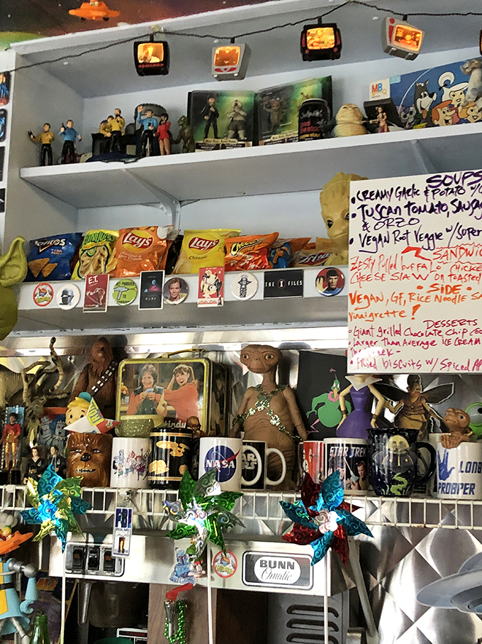 Every inch of wall space serves as a shrine to sci-fi fandom, with collectibles from Star Wars, Trek, and beyond watching over your meal.