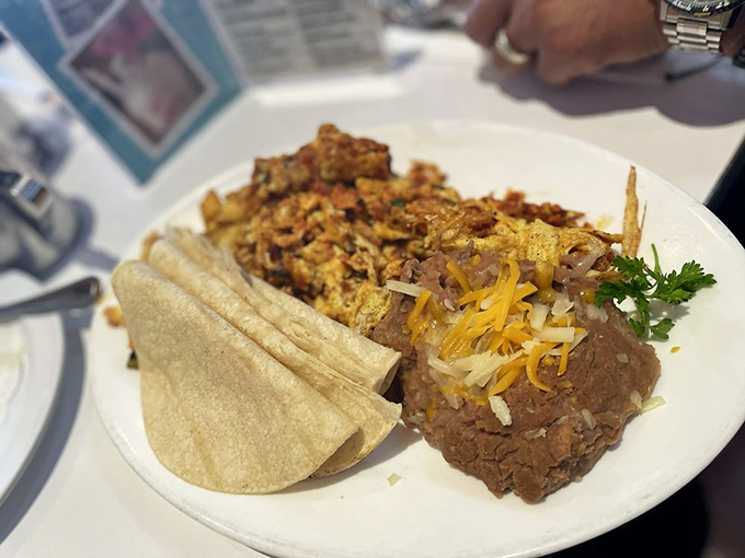 Home fries that actually taste like home, if home were a place where potatoes achieved their highest purpose alongside perfectly cooked eggs.