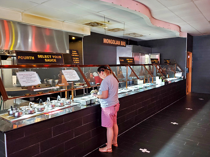 The Mongolian BBQ station: where you become both artist and chef, creating a masterpiece that's either brilliant or a delicious mistake.