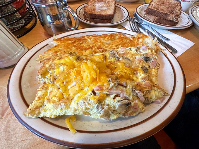 When your breakfast plate requires its own area code: Ole's omelettes deliver the kind of morning satisfaction that ruins lesser breakfasts forever. 