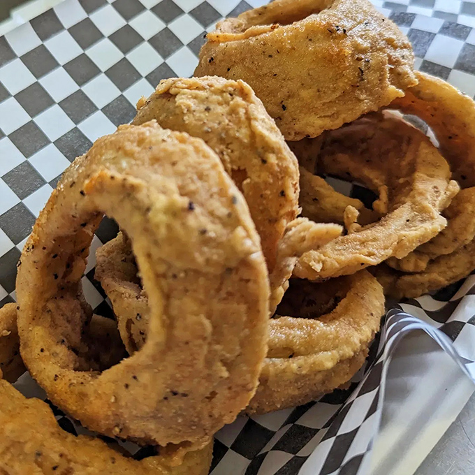 These onion rings aren't just side dishes &ndash; they're golden halos of crispy perfection that deserve their own moment in the spotlight. 