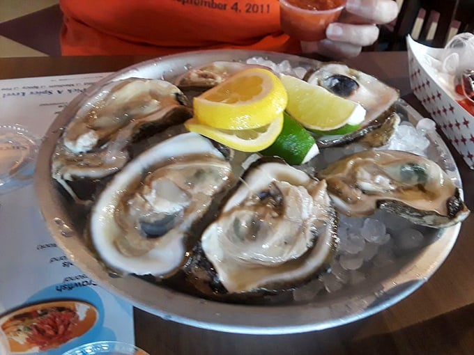 Fresh oysters on the half shell, gleaming like pearls with citrus accents &ndash; ocean elegance that traveled all the way to Indiana.