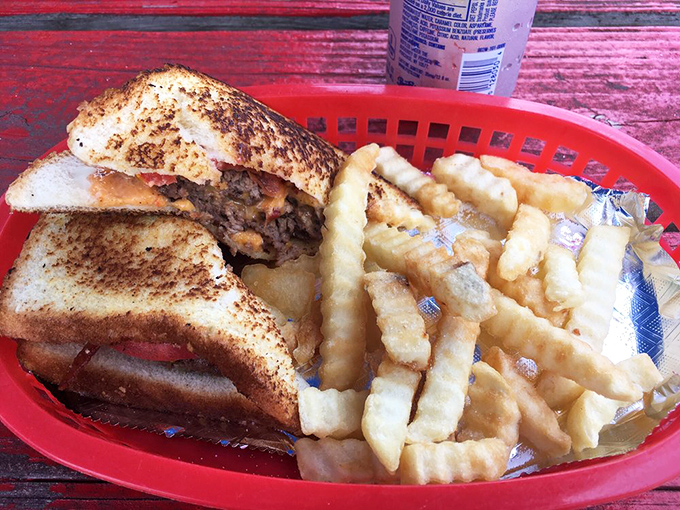 Whoever first thought to melt pimento cheese on a burger deserves their own national holiday. This sandwich is Southern comfort redefined.