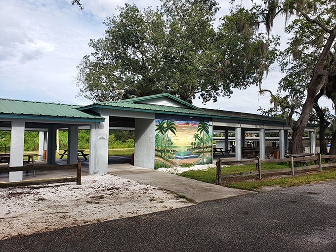 The community pavilion stands ready for gatherings, its tropical mural a charming nod to the unexpected marriage of Amish traditions and Florida scenery.