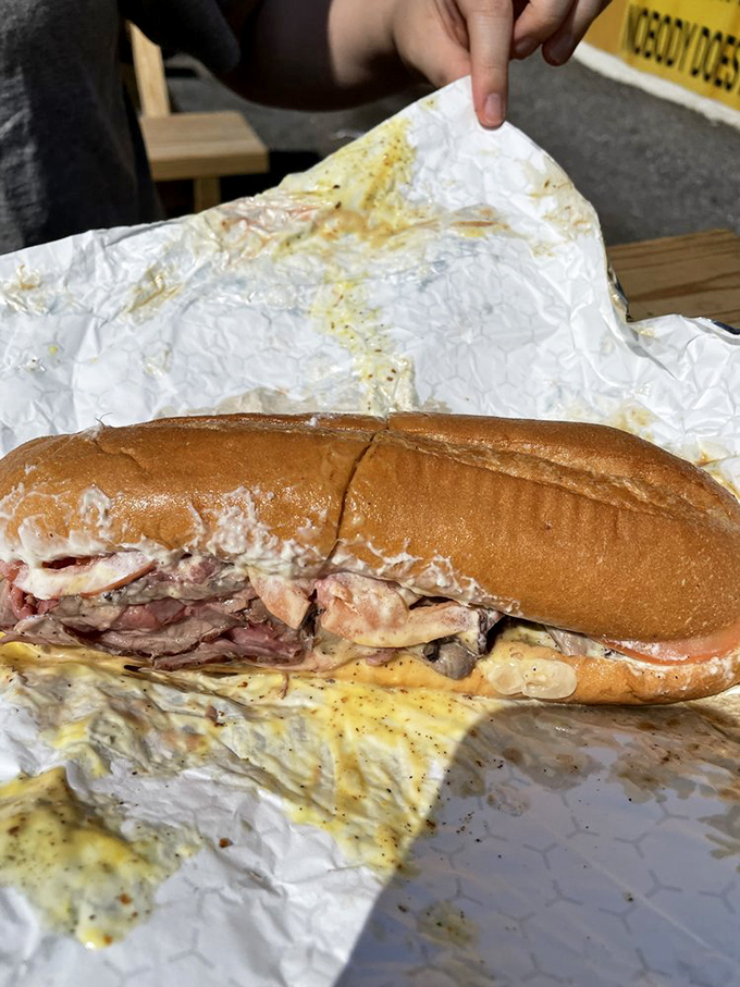 The pit beef sub: where simplicity meets abundance. That roll is performing heroic work containing all that smoky goodness.