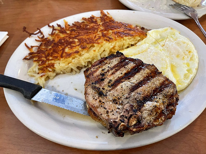 The breakfast of champions who don't plan on moving much afterward. That hash brown's crispy exterior deserves its own fan club.
