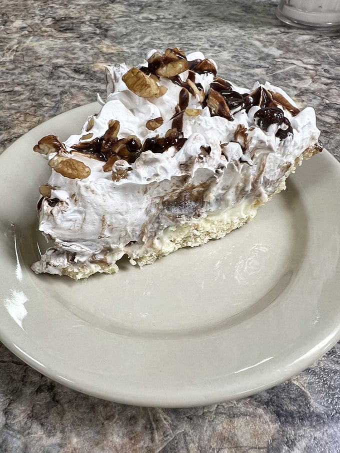 This slice of heaven features pecans and chocolate sauce, creating a sweet symphony that would make even the most dedicated dieter surrender.