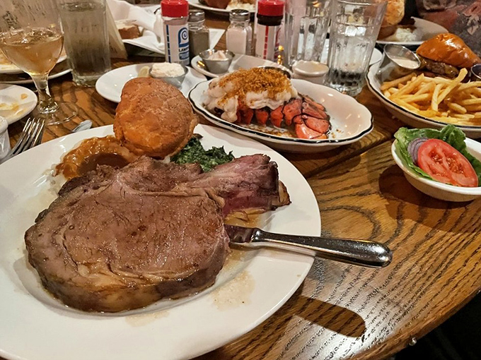 Surf meets turf in the most harmonious relationship since Fred and Ginger – prime rib and lobster sharing a plate like they were always meant to be.