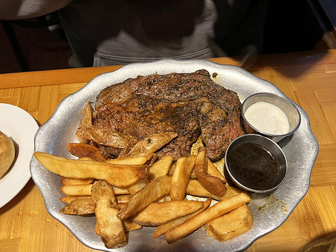 Prime rib so magnificent it deserves its own ZIP code, with steak fries standing guard like delicious, golden sentinels.