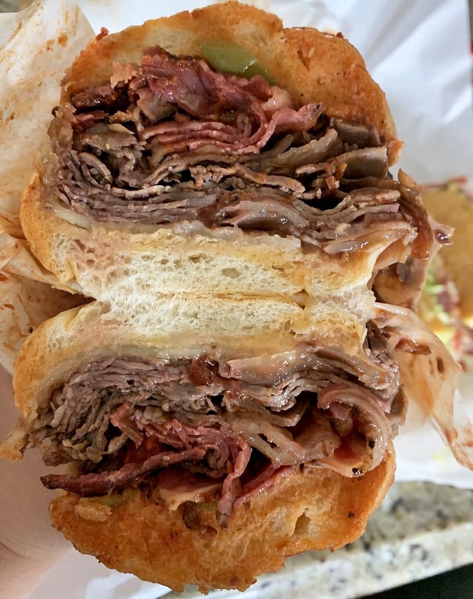 Layer upon layer of thinly-sliced roast beef &ndash; like a meat geology lesson where each stratum tells a delicious story.
