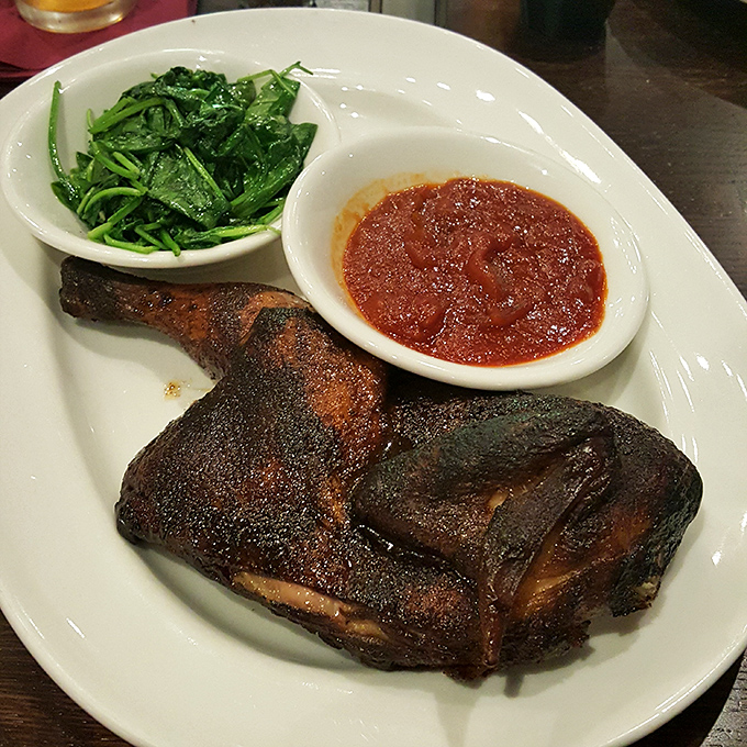 That smoke ring on the chicken isn't just for show—it's five hours of hickory-smoking evidence that patience really is a virtue worth tasting.