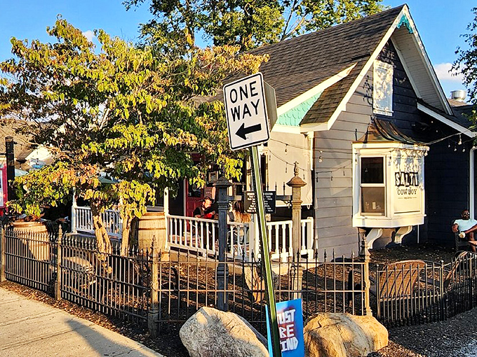 Salty Cowboy's cottage exterior belies the Southwestern spirit within. That wrought iron fence isn't keeping anyone out&mdash;it's corralling them in.