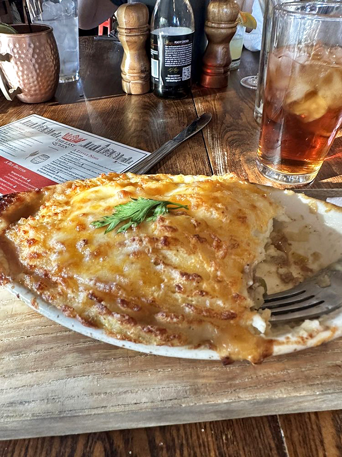 A half-eaten Shepherd's Pie tells the real story—it was too delicious to pause for a photo until halfway through.