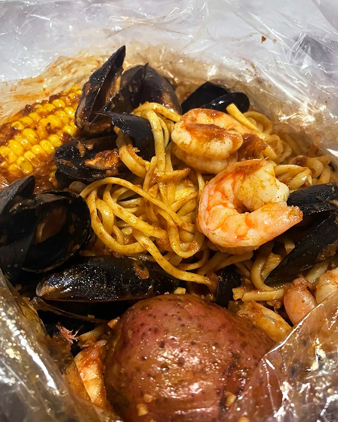Seafood alchemy at its finest &ndash; where noodles become flavor sponges and mussels open up to reveal their secrets in a steamy plastic paradise.