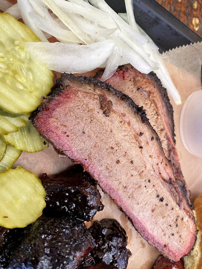 That smoke ring isn't just pink&mdash;it's the barbecue equivalent of a Michelin star. The pepper-crusted bark is what dreams and extra napkins are made for.