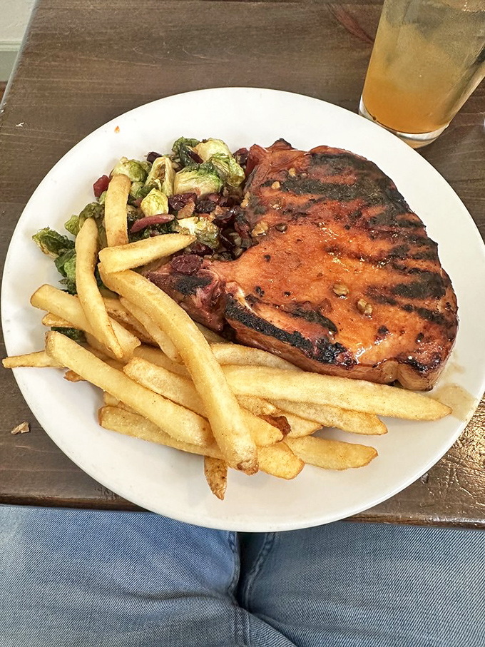 This smoked pork chop with fries and Brussels sprouts is the kind of plate that silences conversation&mdash;except for the occasional "mmm" of pure satisfaction.