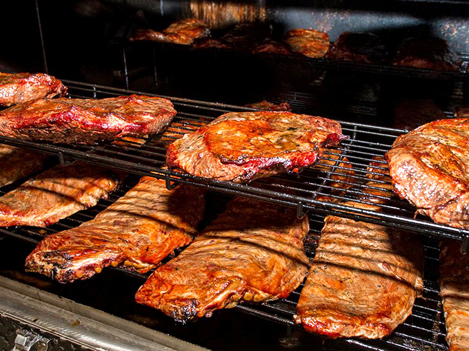 The smoker's magic chamber, where meat transforms from ordinary to extraordinary through the ancient alchemy of smoke and patience.