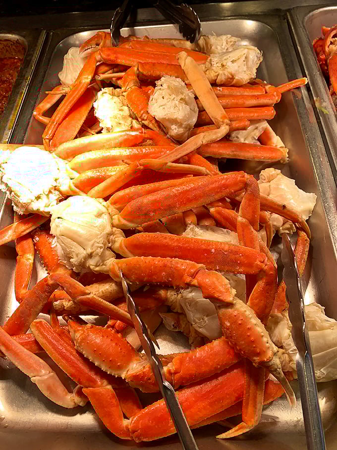 Snow crab legs stacked like nature's Lincoln Logs, waiting for eager hands. The seafood equivalent of striking gold in the Klondike.