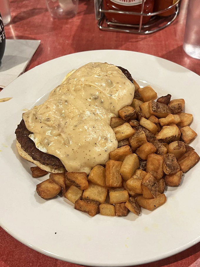 Behold the breakfast architecture&mdash;a savory foundation of potatoes supporting a tower of flavor topped with creamy sauce that dreams are made of.