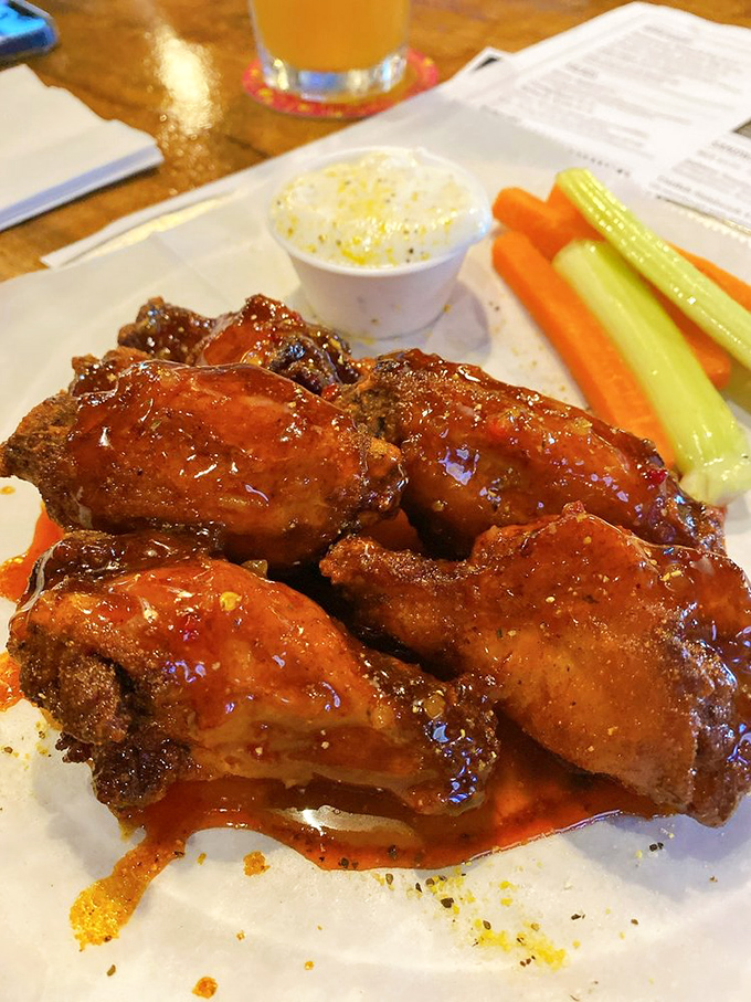 These wings don't just talk the talk&mdash;they sauce the sauce. Each one glistening like it just won a beauty pageant.