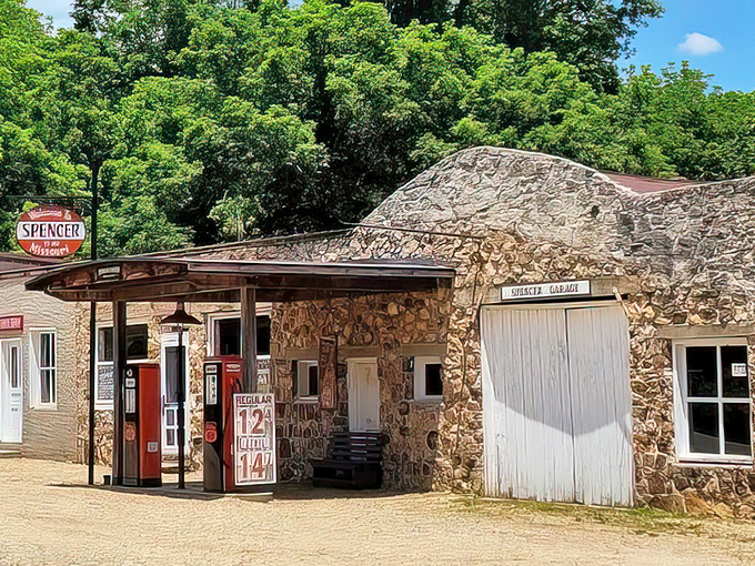 Spencer's stone service station stands as a fossil of America's automotive adolescence. Premium was once just 12 cents a gallon!