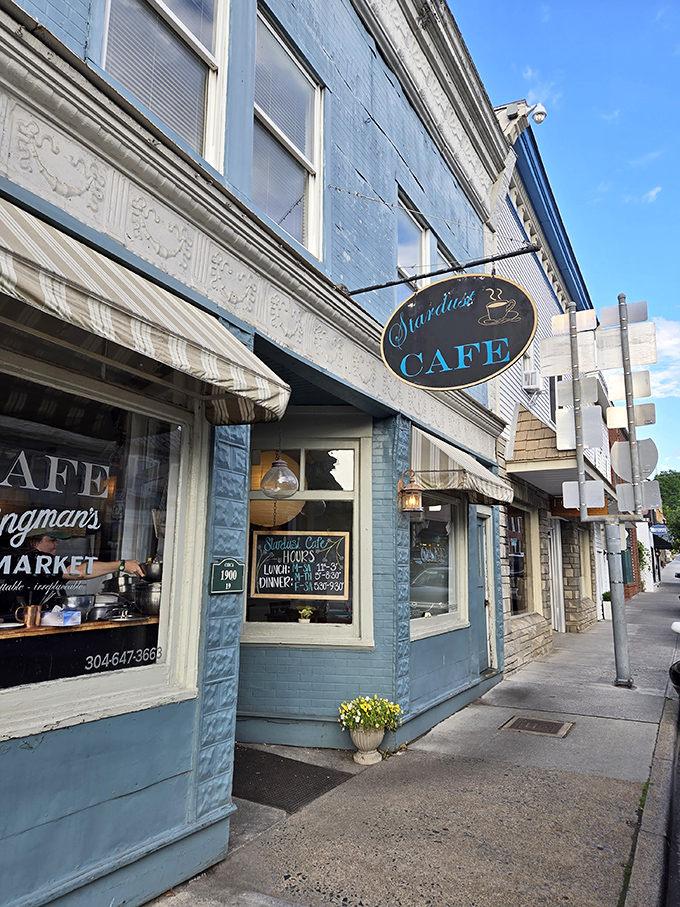 Stardust Cafe's blue fa&ccedil;ade stands out on Washington Street like a culinary beacon, promising locally-sourced delights within.