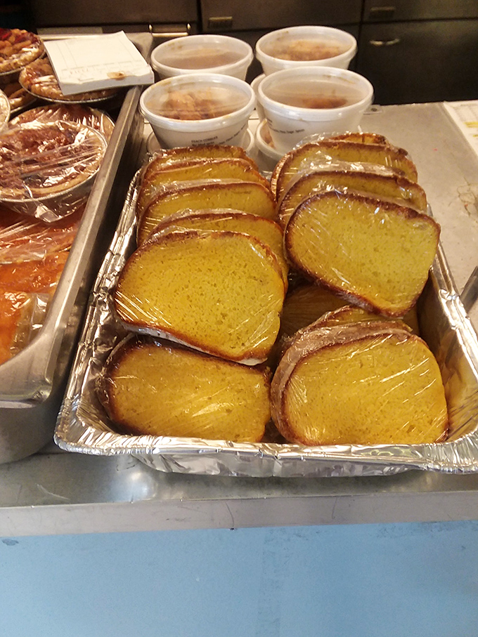 Cornbread so moist and golden, it's the unsung hero of the soul food symphony playing on this plate.