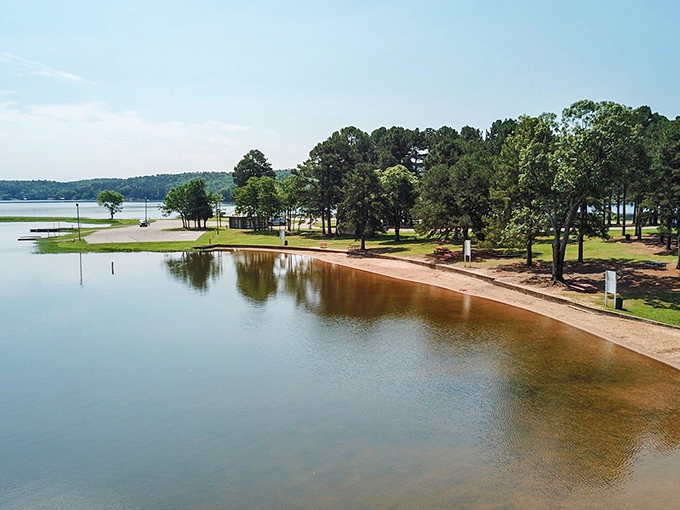 Nature's swimming pool comes with a sandy beach and a view that beats any resort. No chlorine, just pure Arkansas splendor.