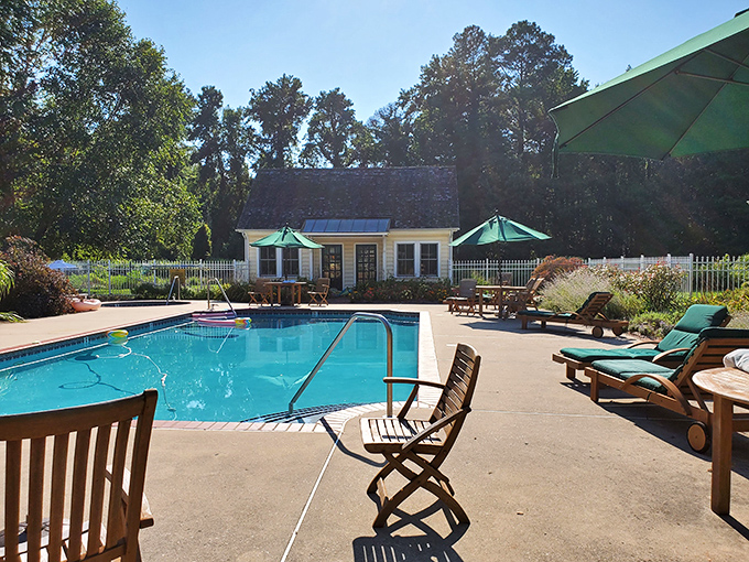 Pool or paradise? The answer is yes. Those Adirondack chairs are practically begging you to bring a summer read and forget what day it is.