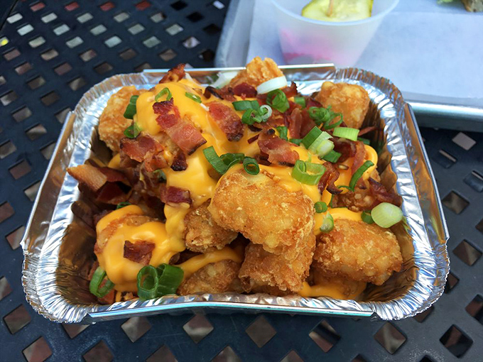 Tater tots living their best life, smothered in cheese and bacon. Proof that sometimes the side dish steals the show without a hint of remorse.