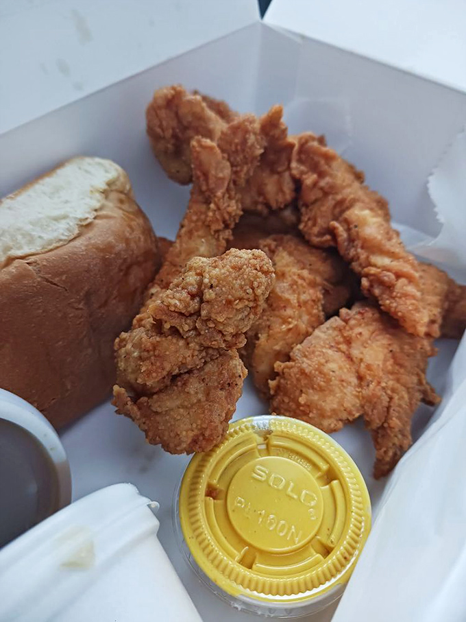 A white box of tender heaven with a side of fries and bread&mdash;the kind of meal that makes you forget about fancy dining altogether.