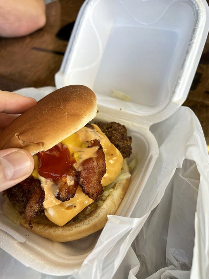 Fried onion rings add a crispy crown to this tower of beef and cheese - it's the burger equivalent of wearing formal attire.