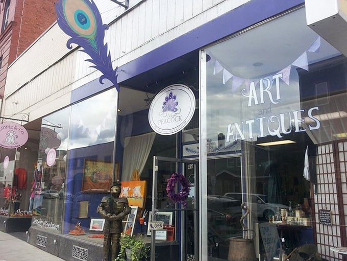 The Purple Peacock's window display proves small-town antique shops can have big personality. Marie Kondo would have a panic attack, but I'm delighted.