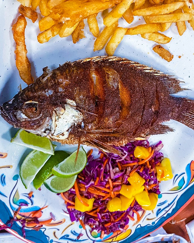 This whole fried tilapia stares back as if to say, "Yes, I'm delicious, and yes, I'm worth the drive to Olathe." The colorful slaw seals the deal.