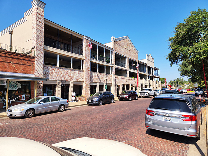 Multi-story buildings with classic balconies line Front Street, where shoppers pause in doorways and history whispers from every brick.