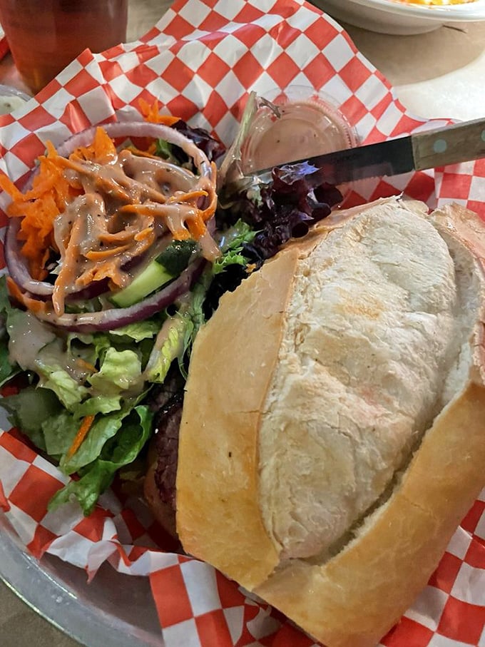 This burger isn't just food; it's architecture&mdash;layers of flavor stacked with artistic precision and a side salad for those pretending to be virtuous.