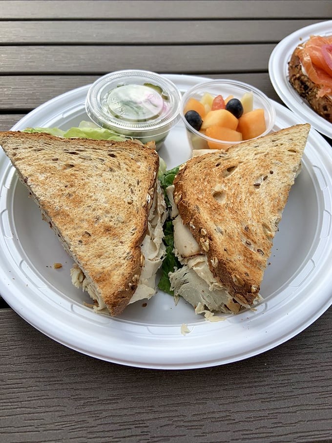 Not just a turkey sandwich but a complete experience &ndash; house-roasted turkey with fresh fruit and creamy side that transforms lunch from routine to remarkable.